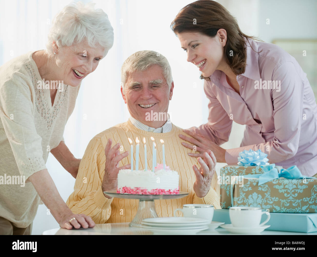 Happy family surprising father birthday hi-res stock photography and ...
