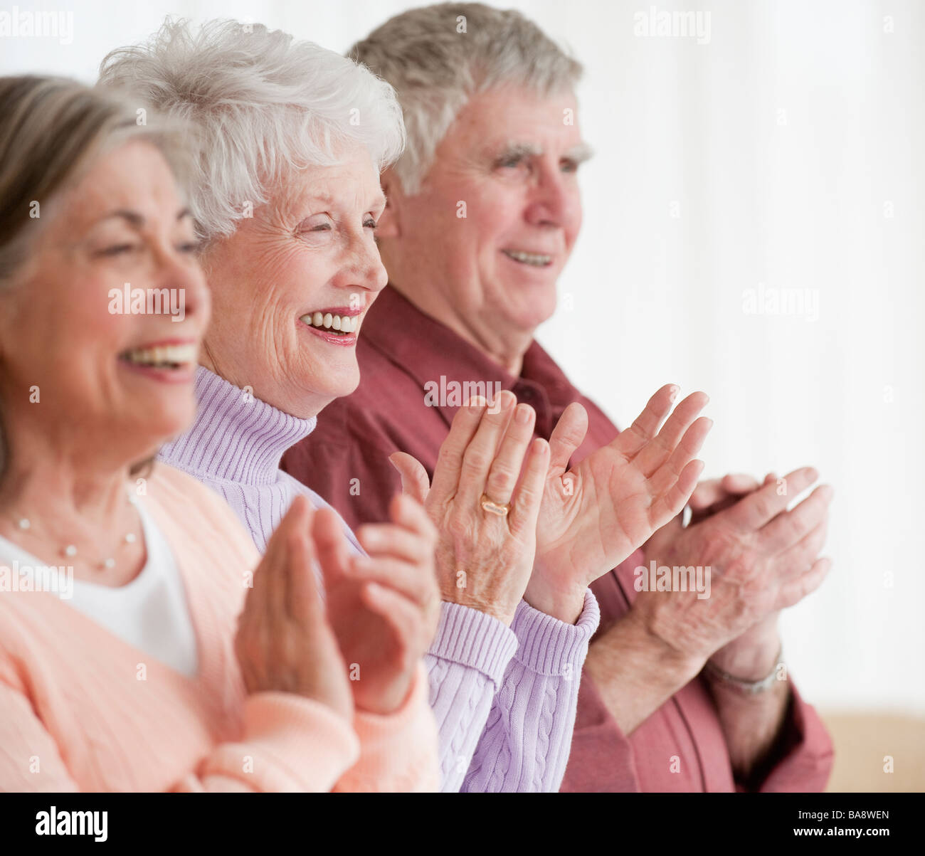 Man woman laughing clapping hands hi-res stock photography and images ...