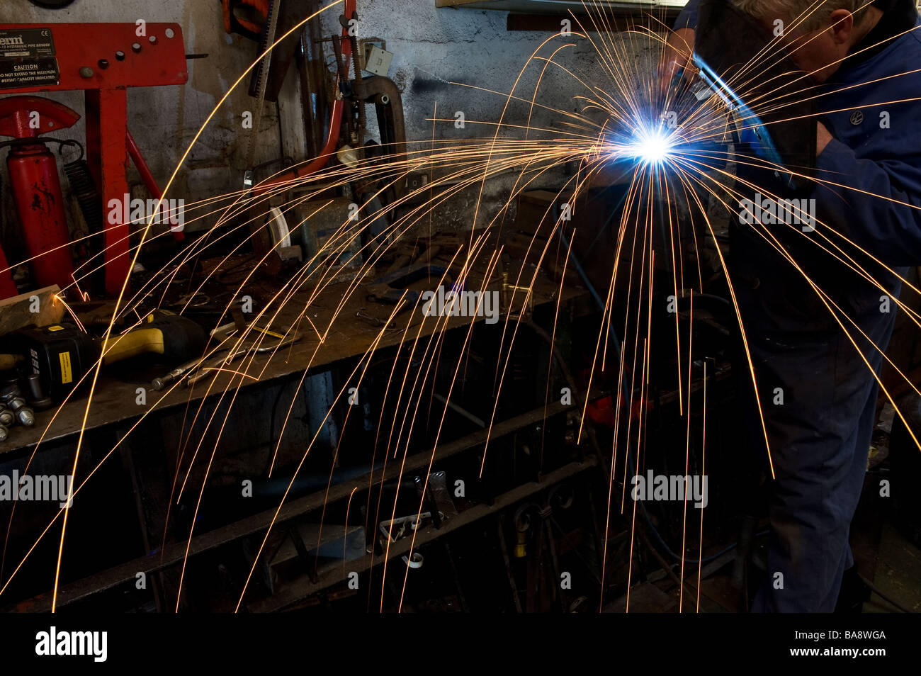 Sparks from arc welding. Photo by Gordon Scammell. Photo by Gordon ...