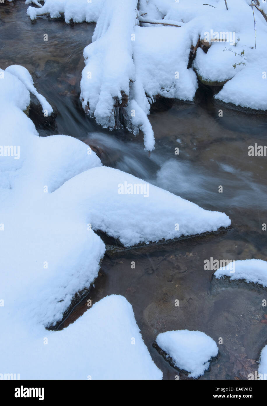 Snowy stream in winter Stock Photo - Alamy