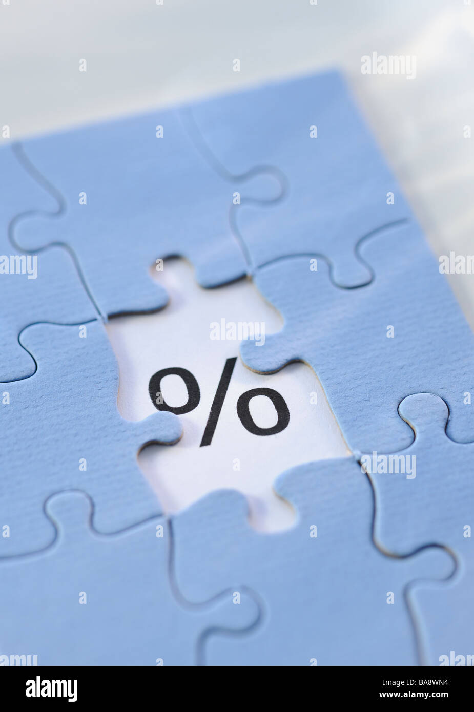 Puzzle and percent sign Stock Photo - Alamy