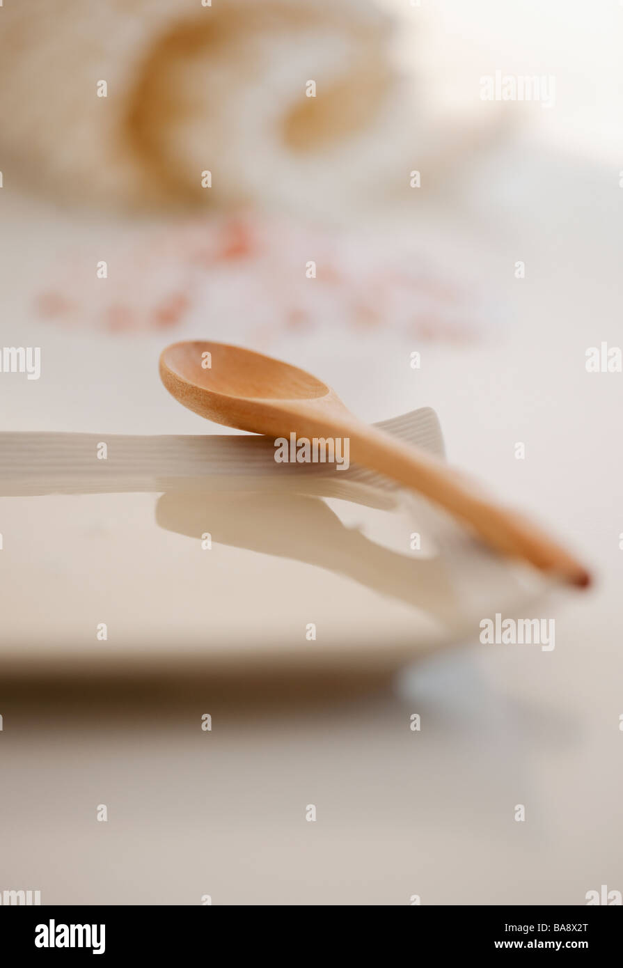 Wooden spoon and salt scrub Stock Photo - Alamy