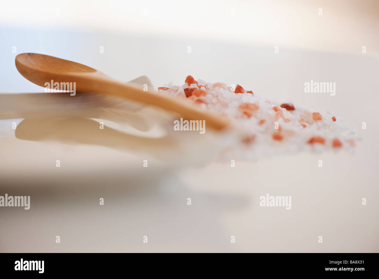 Wooden spoon and salt scrub Stock Photo - Alamy