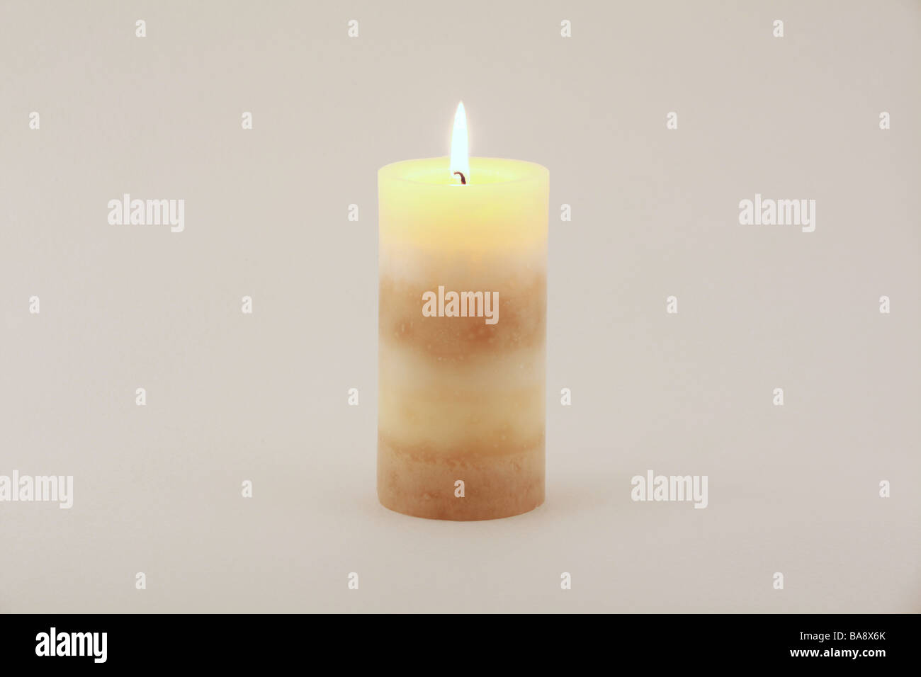 A lit candle Stock Photo - Alamy