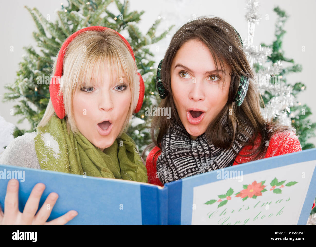 Singing at christmas hi-res stock photography and images - Alamy