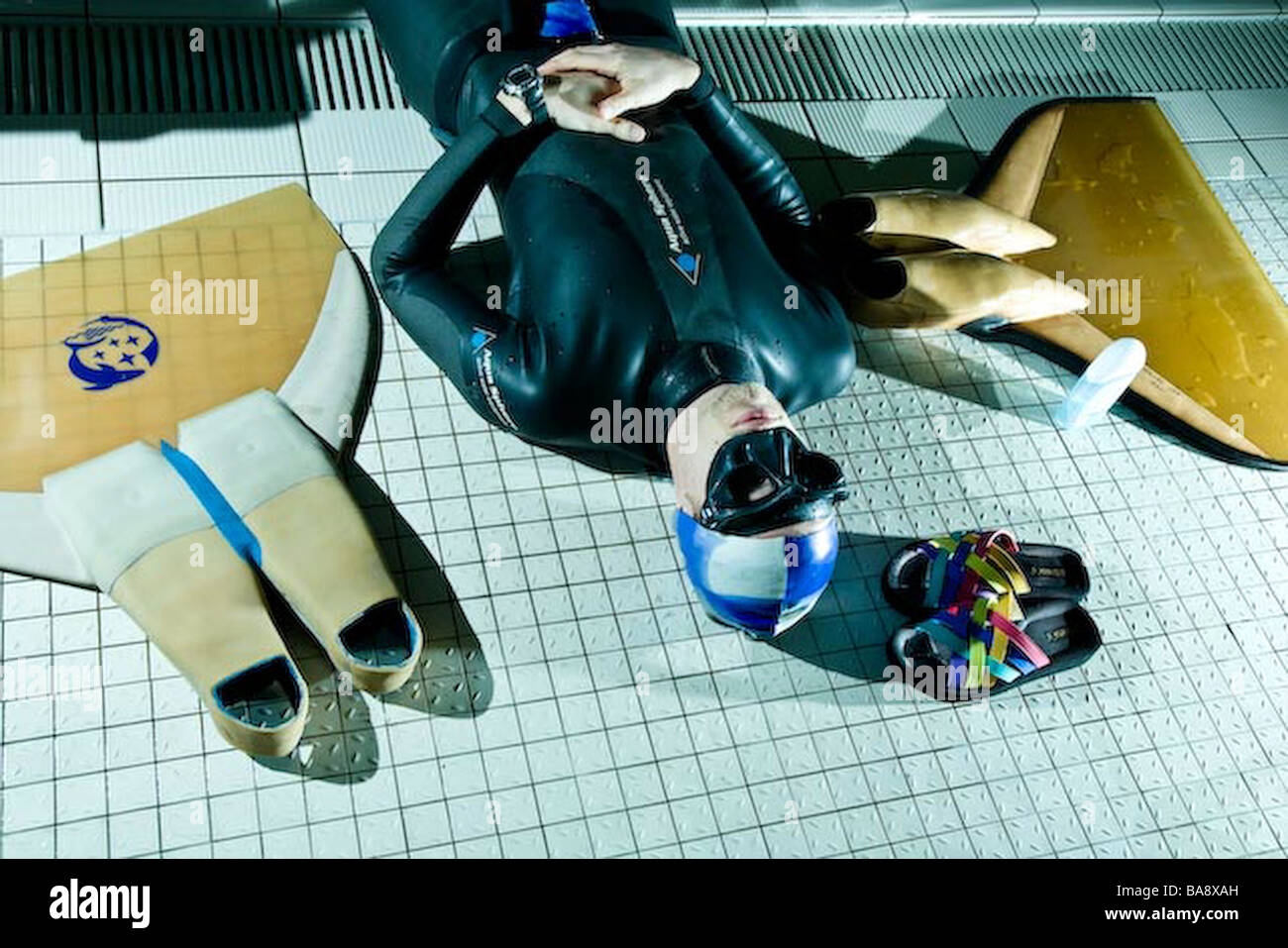 Man concentration before apnea dive with monopalm Stock Photo - Alamy