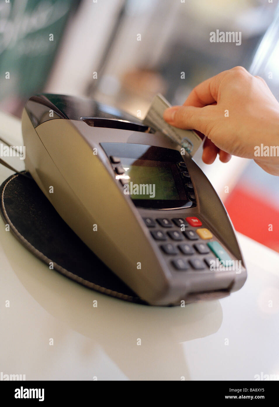 Paying with a credit card Stock Photo - Alamy