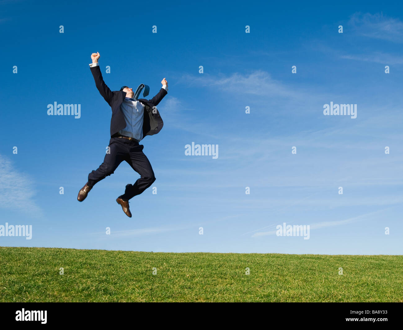 Business man jumping in air hi-res stock photography and images - Alamy
