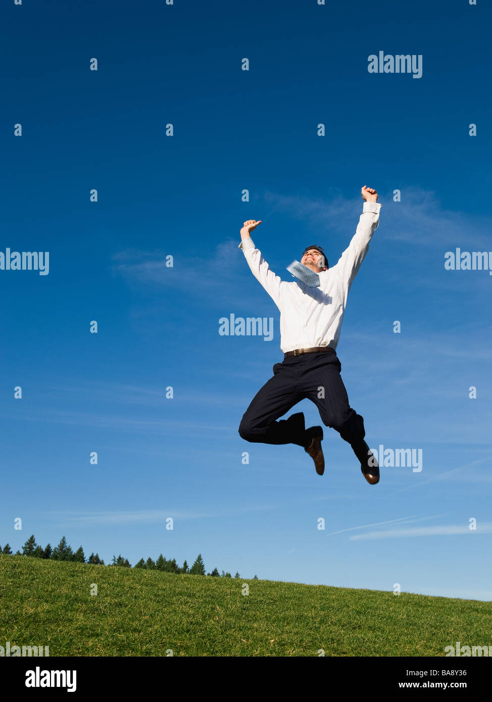 Full length celebrating jumping in air hi-res stock photography and ...