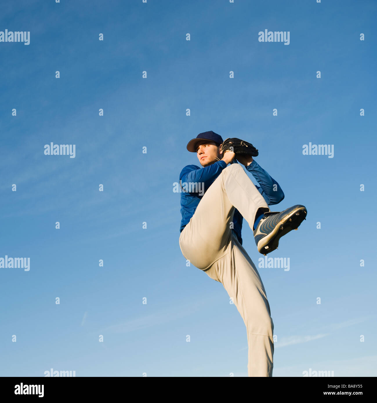 Baseball player throwing ball Stock Photo - Alamy