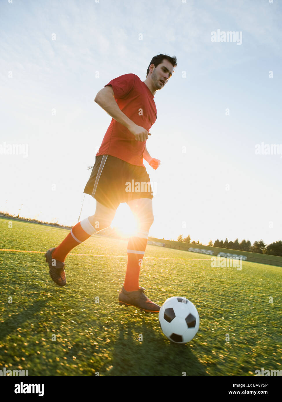 Dribbling soccer ball hi-res stock photography and images - Alamy