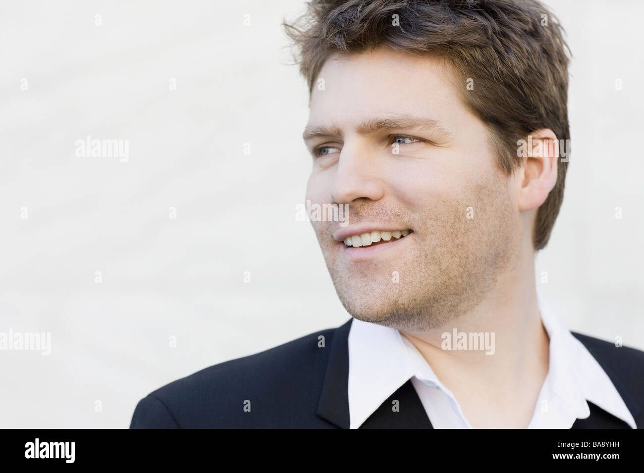 Portrait of smiling businessman Stock Photo - Alamy