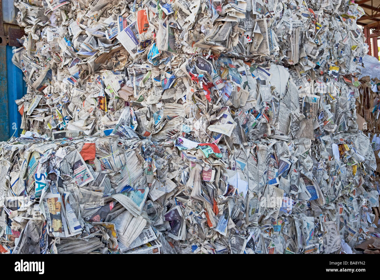 Bundles of paper at recycling plant Stock Photo - Alamy