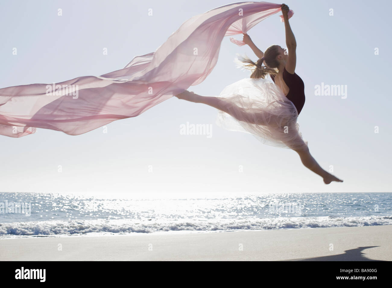 Dancer Leaping On Beach
