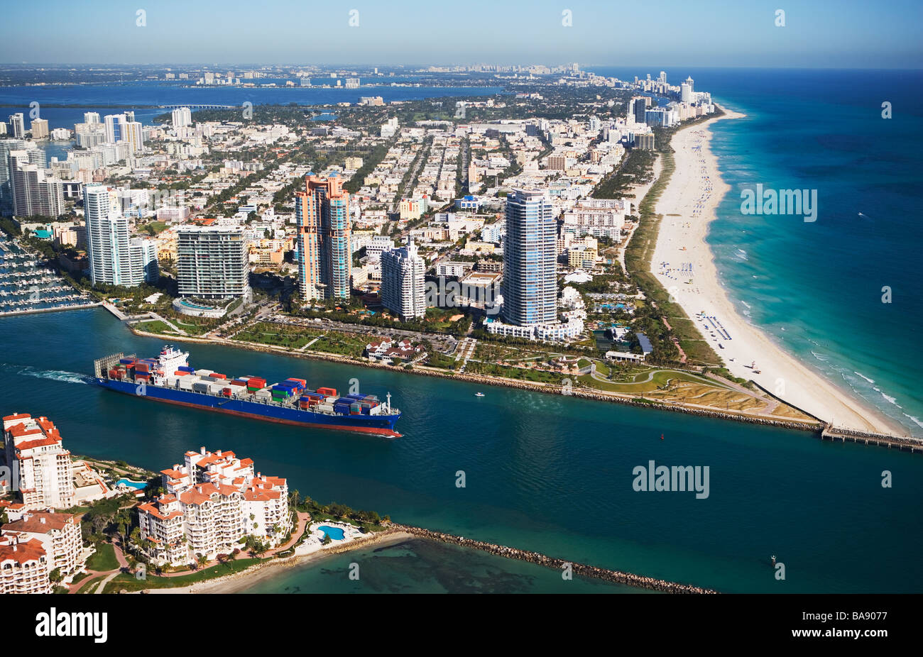 Aerial view of waterfront city and cargo ship Stock Photo - Alamy