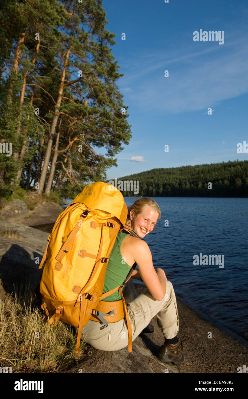 Woman carries water back hi-res stock photography and images - Alamy