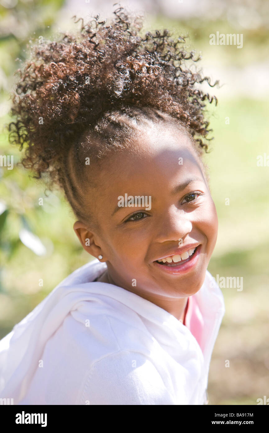 Close up african girl watching hi-res stock photography and images - Alamy