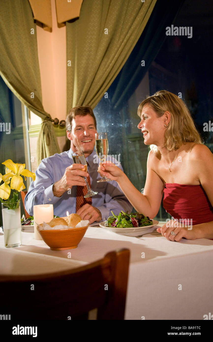 Romantic couple dining in restaurant Stock Photo - Alamy