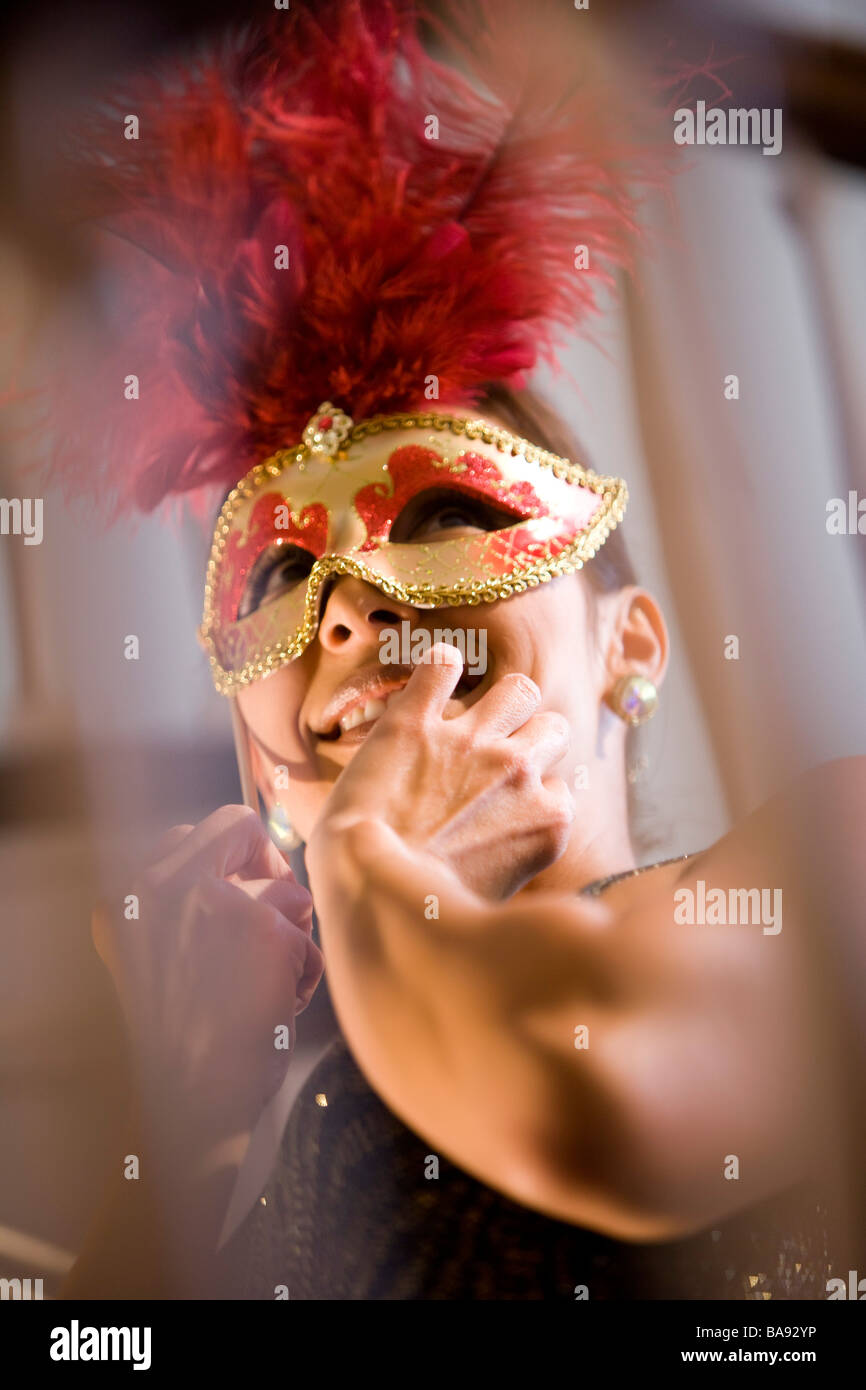 Hispanic woman in formal gown wearing mask Stock Photo - Alamy