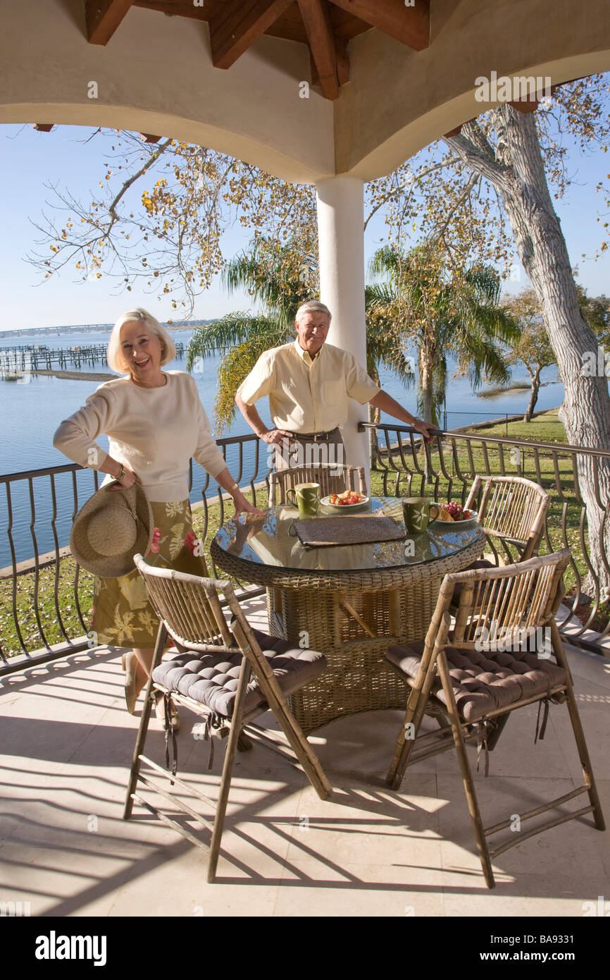 Senior man standing veranda High Resolution Stock Photography and ...