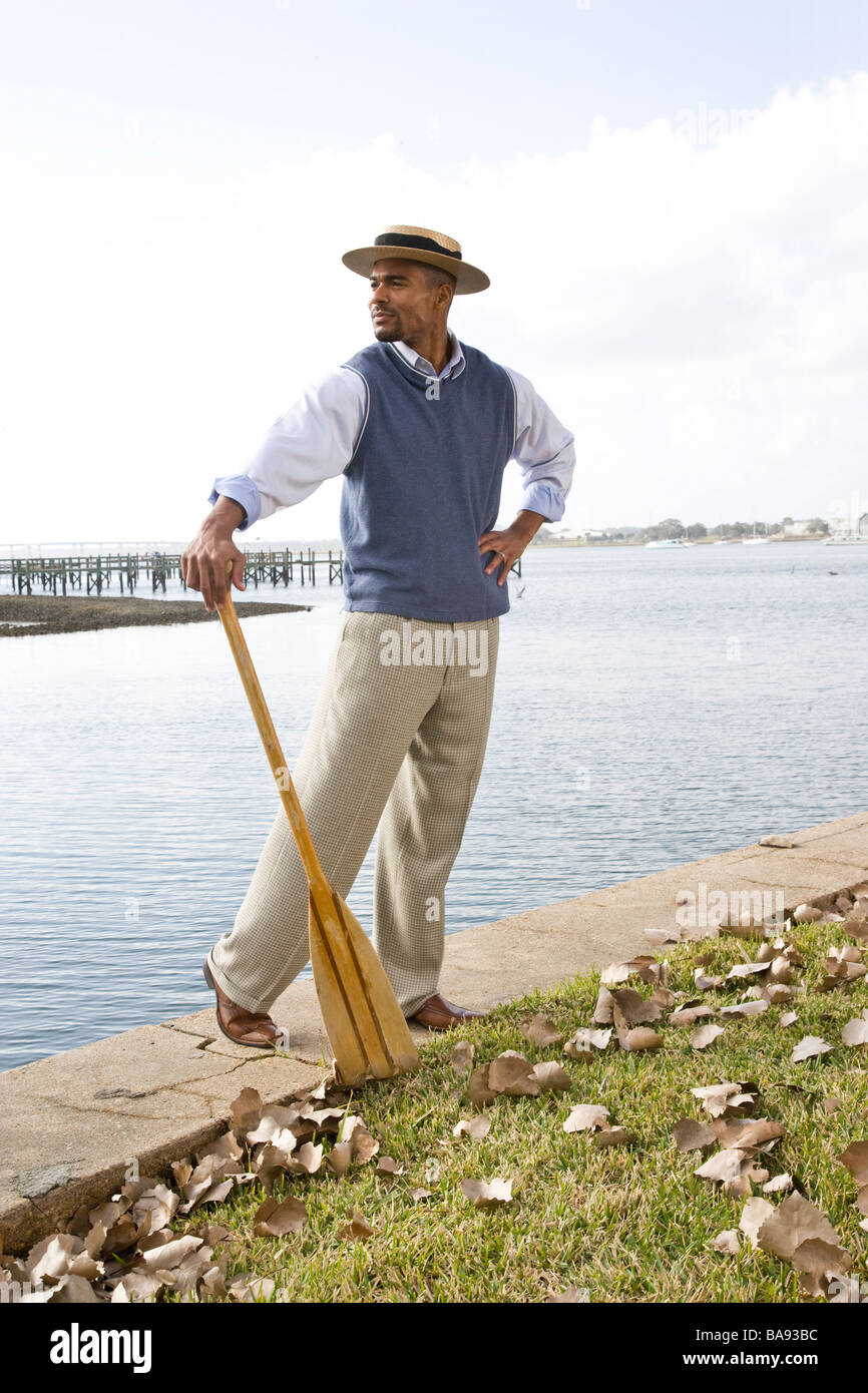 African American gentleman standing near water Stock Photo - Alamy