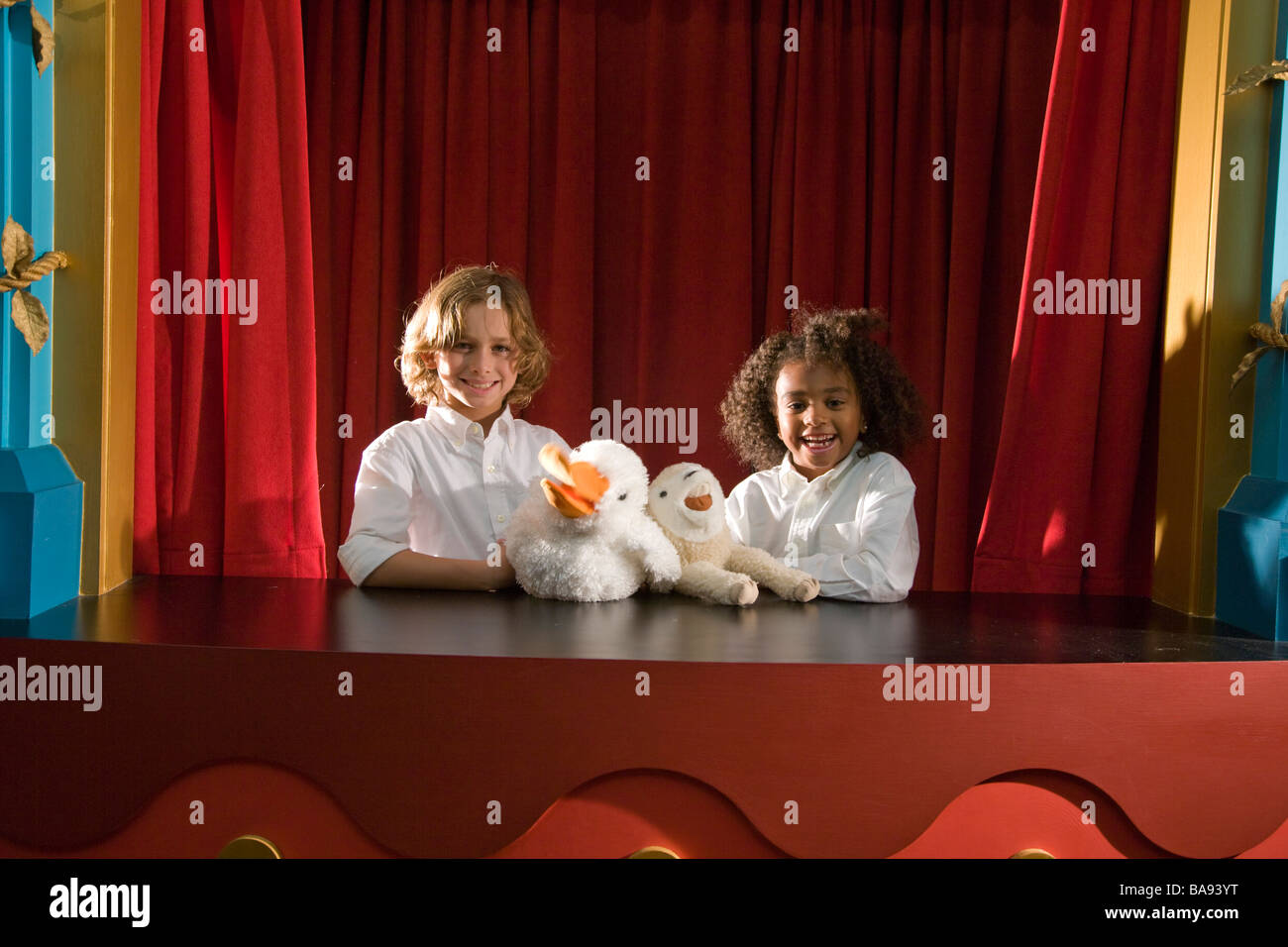 Portrait of school kids performing with animal puppets Stock Photo - Alamy