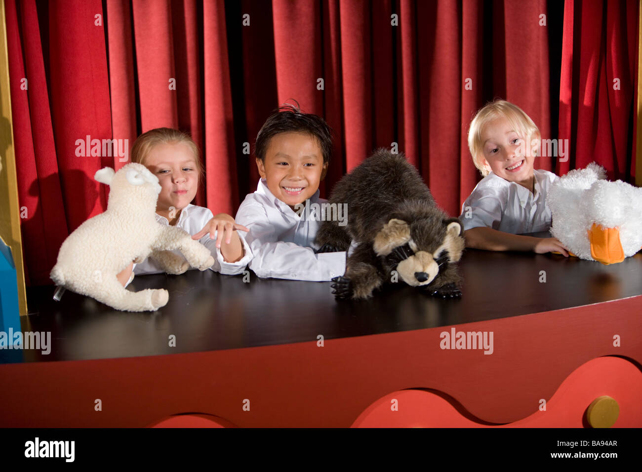 School kids doing puppet show in theatre Stock Photo - Alamy