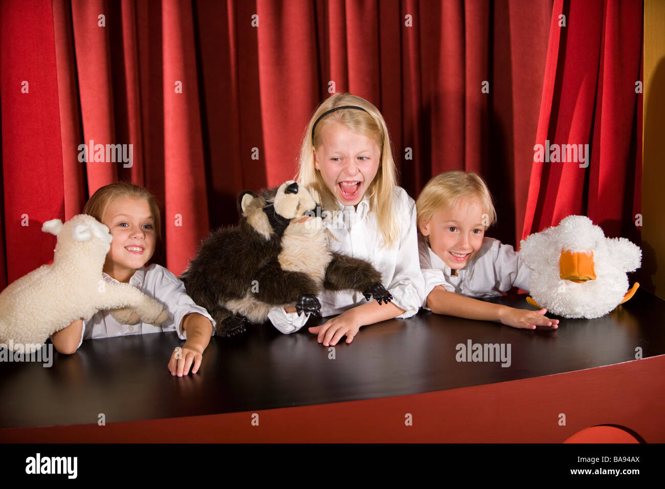 School kids doing puppet show in theatre at library Stock Photo - Alamy