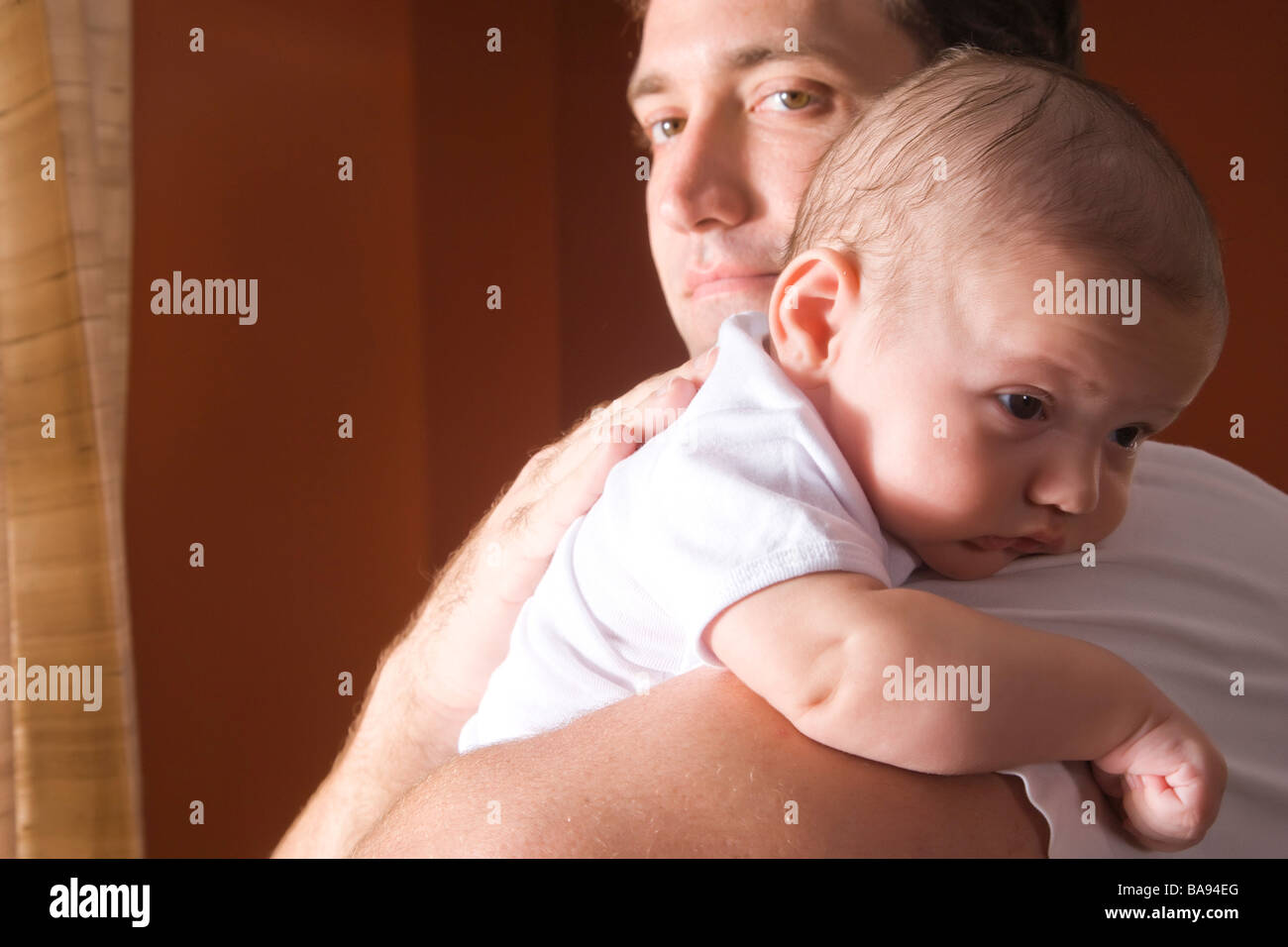 Father carrying son over shoulder hi-res stock photography and images ...