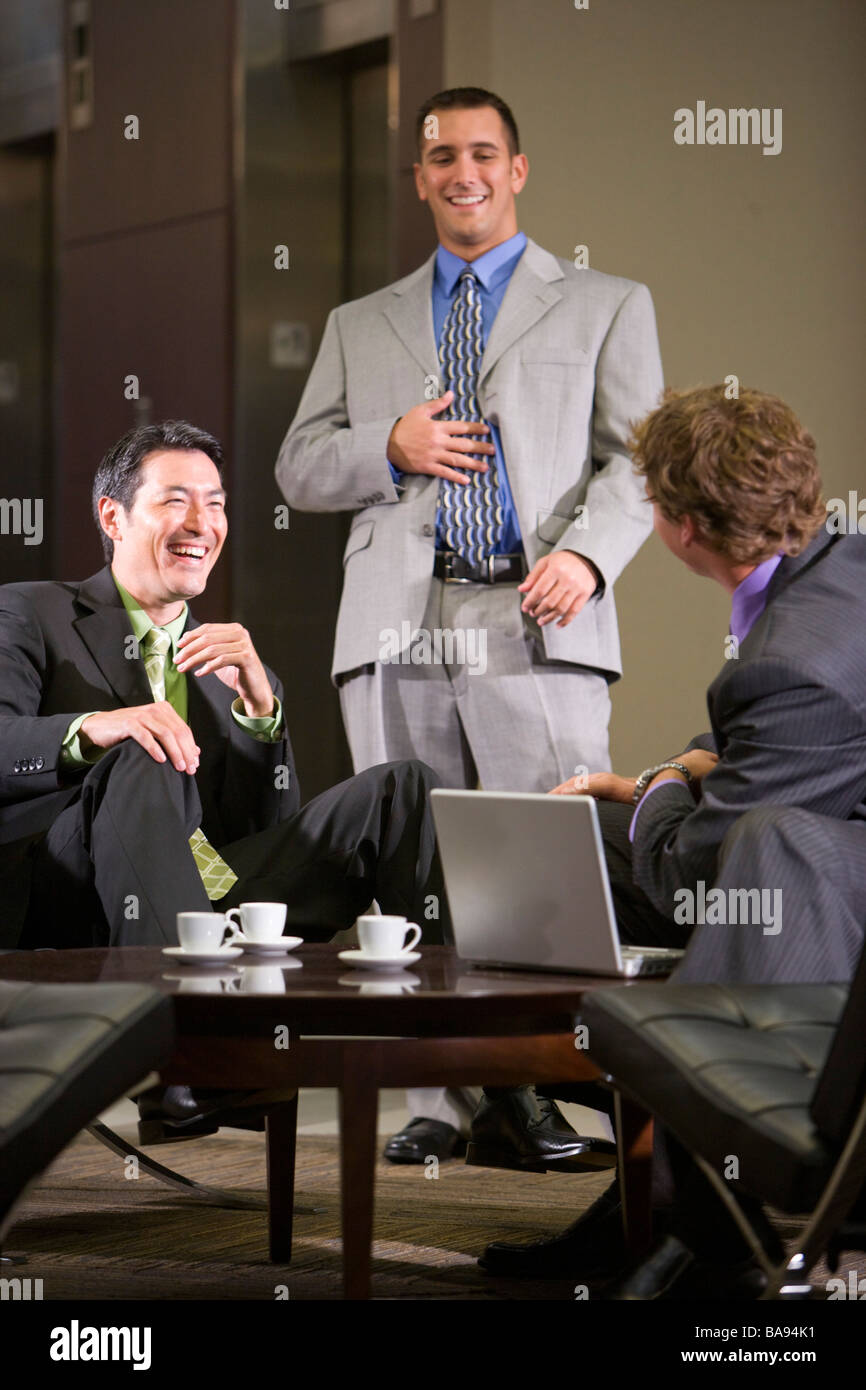 Businessmen meeting over cup of coffee Stock Photo - Alamy