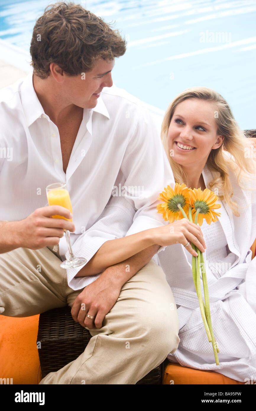 Romantic couple sitting on rooftop hi-res stock photography and images ...