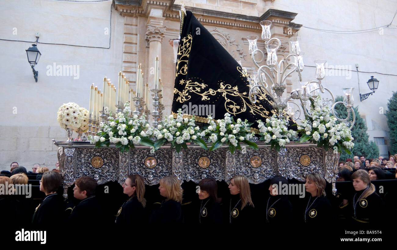 Float with image of The Virgin Mary carried through streets of Catral ...