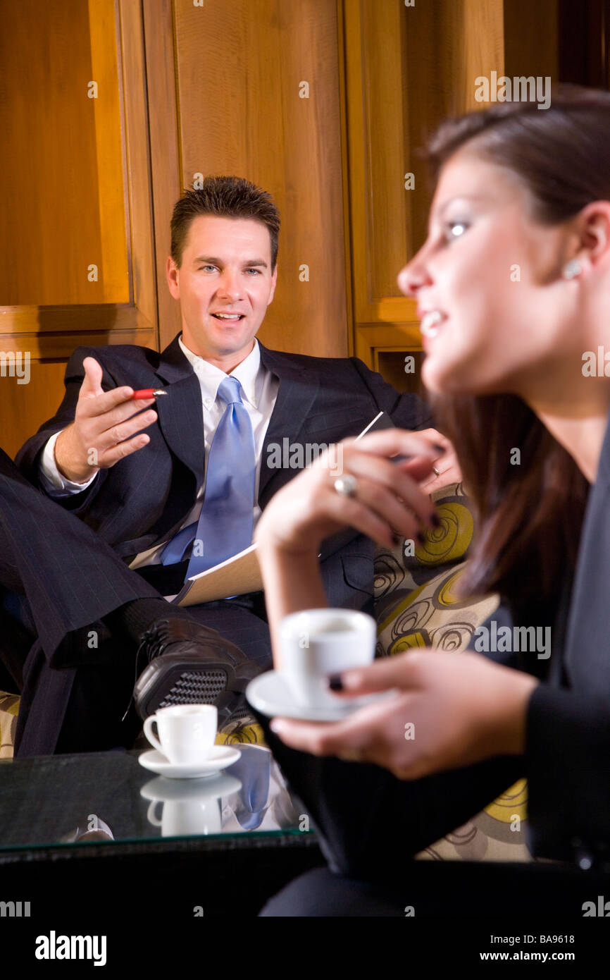 Business people meeting over cup of coffee Stock Photo - Alamy