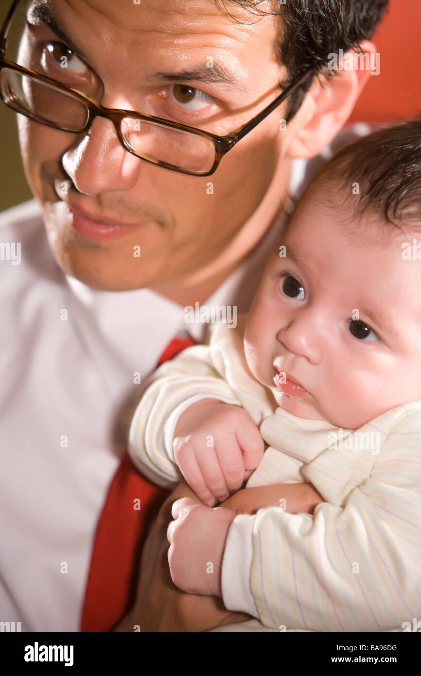 Baby staring at dad hi-res stock photography and images - Alamy