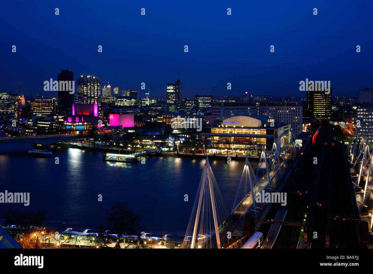 Skyline view of Hungerford Railway Bridge and South Bank Arts complex ...
