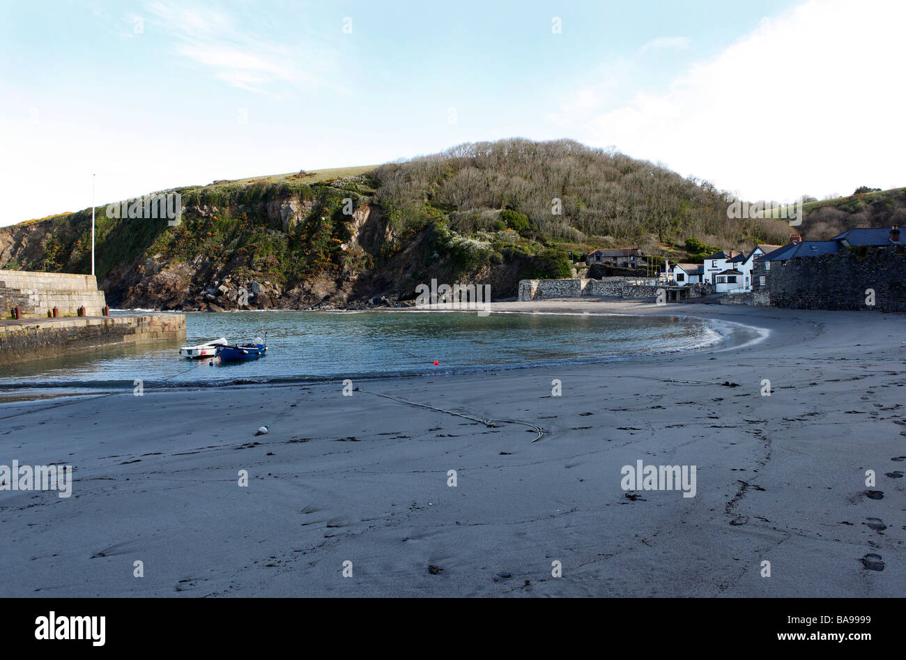 a view of polkerris fishing village on the south coast of cornwall ...