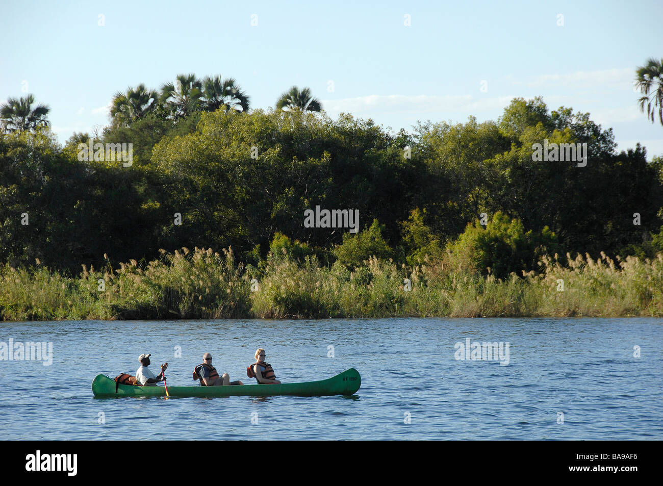 Travel canoe safari canoeing canoes Zambezi river canoeists African ...