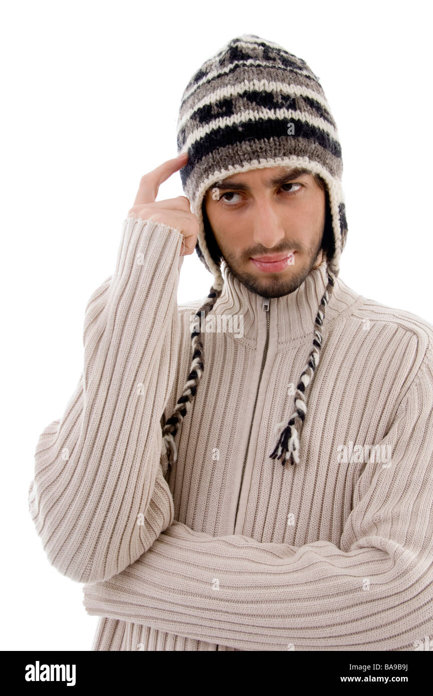 young guy itching his head and looking sideways Stock Photo - Alamy