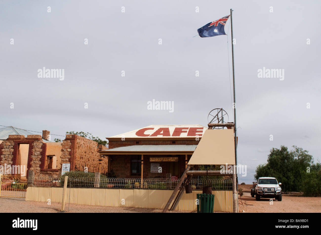 Australian flag waving over a rare café in ghost town of Silverton, NSW ...