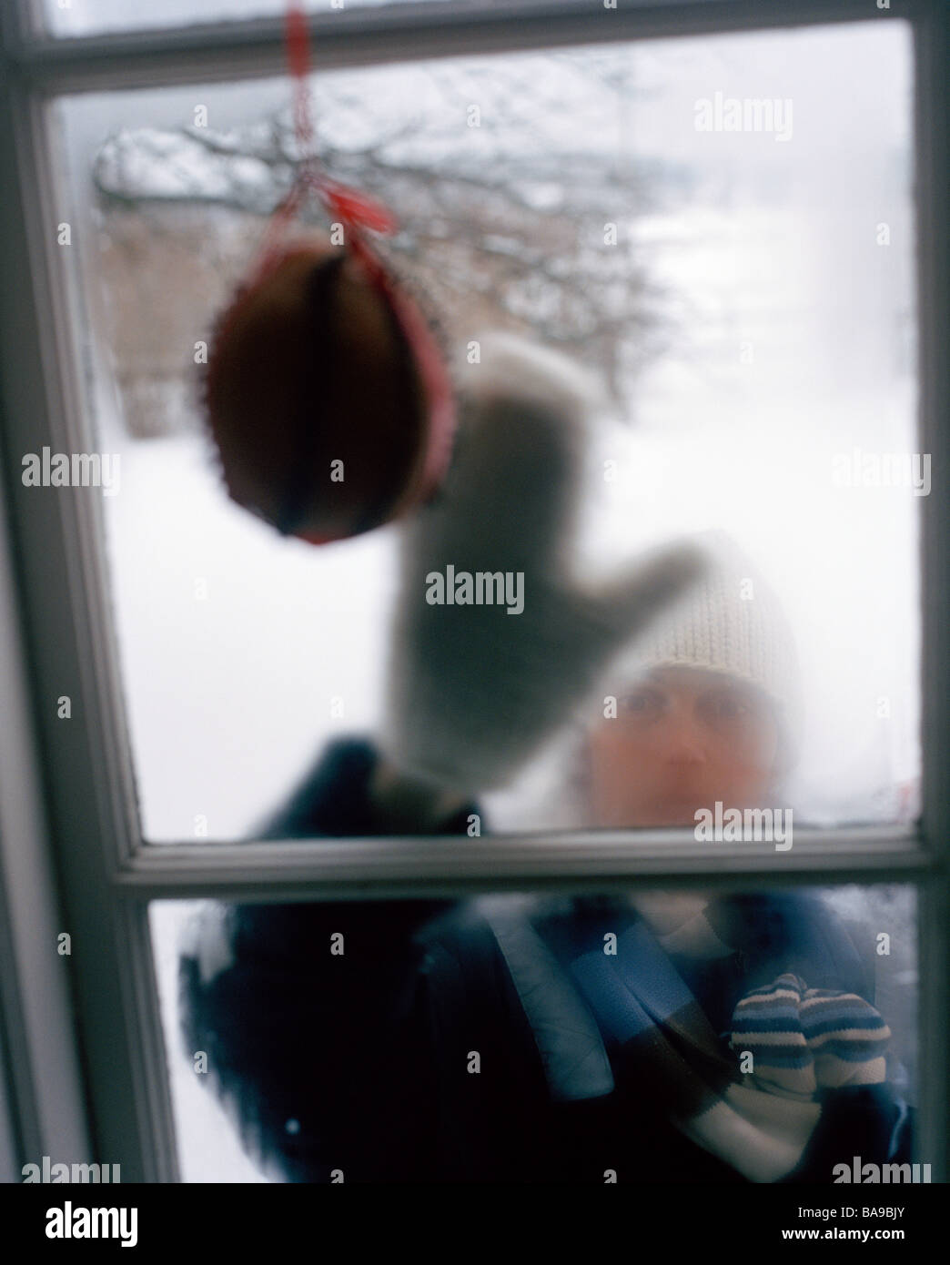 Woman knocking on window hi-res stock photography and images - Alamy