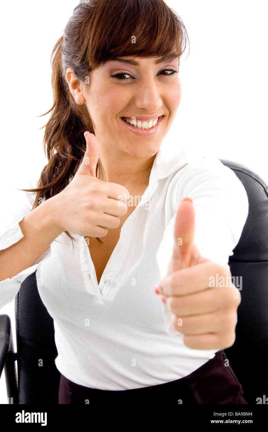 front view of smiling female attorney showing thumbs up Stock Photo - Alamy