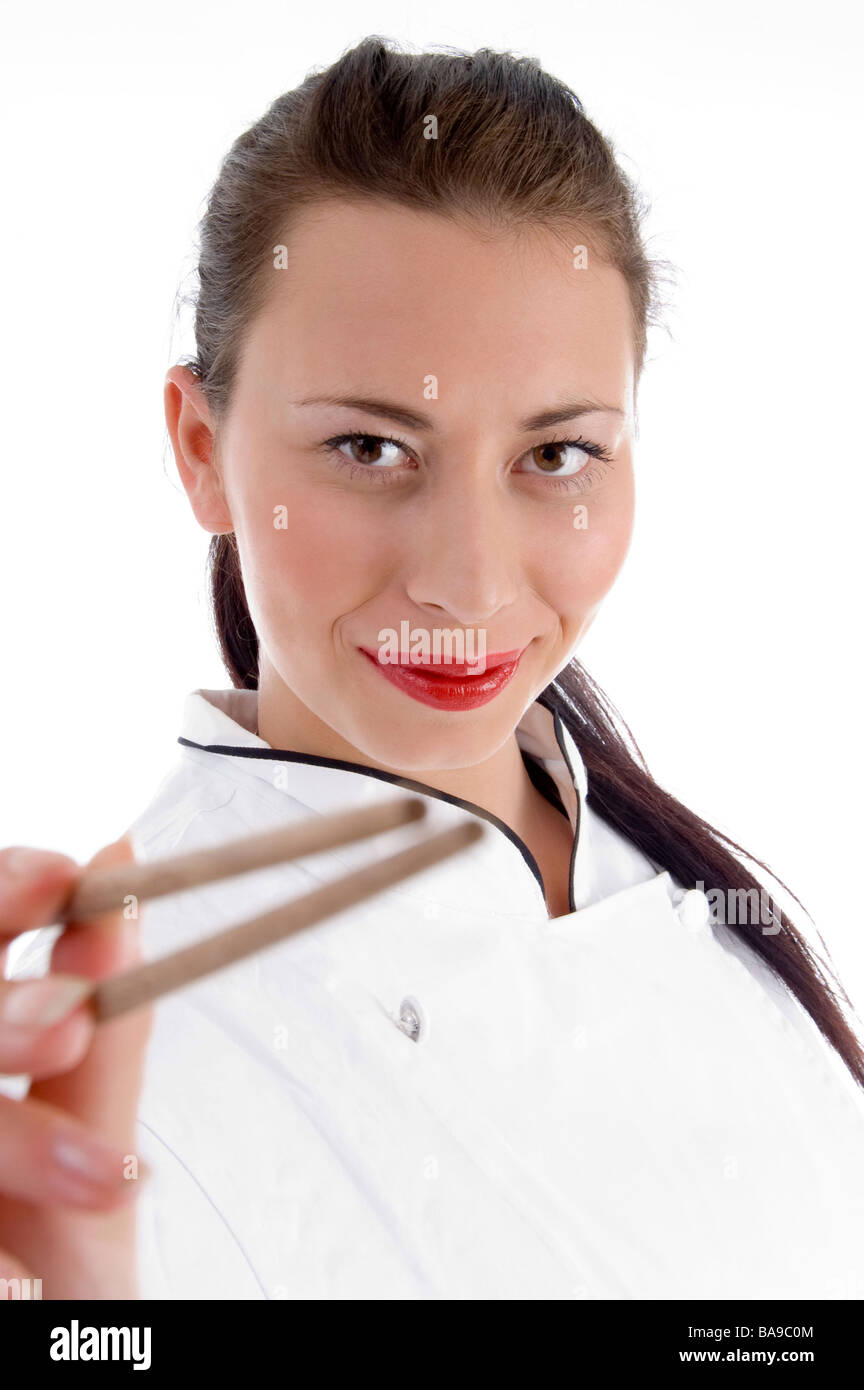 smart chef showing chopsticks Stock Photo - Alamy