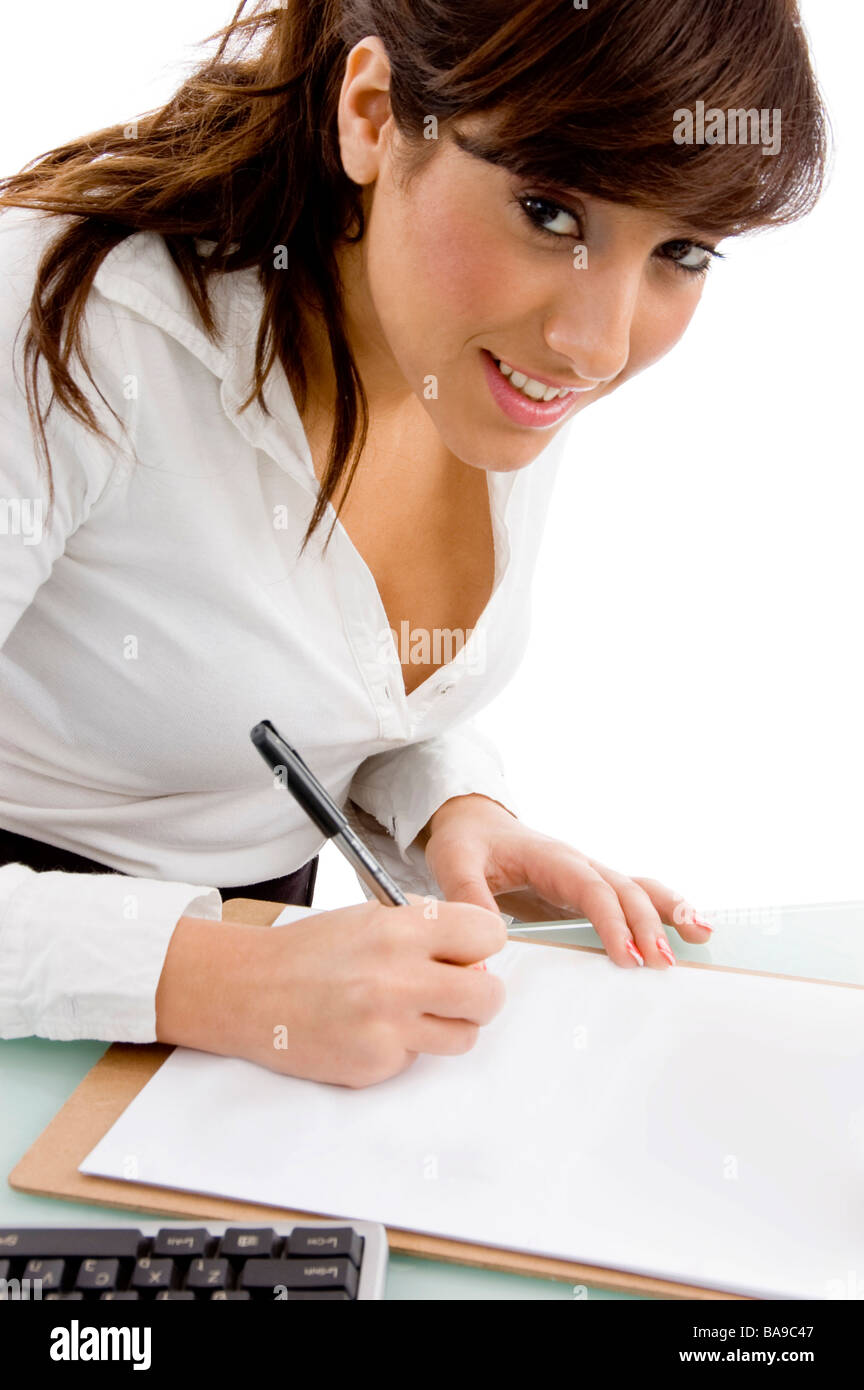 front view of smiling executive signing on agreement Stock Photo - Alamy