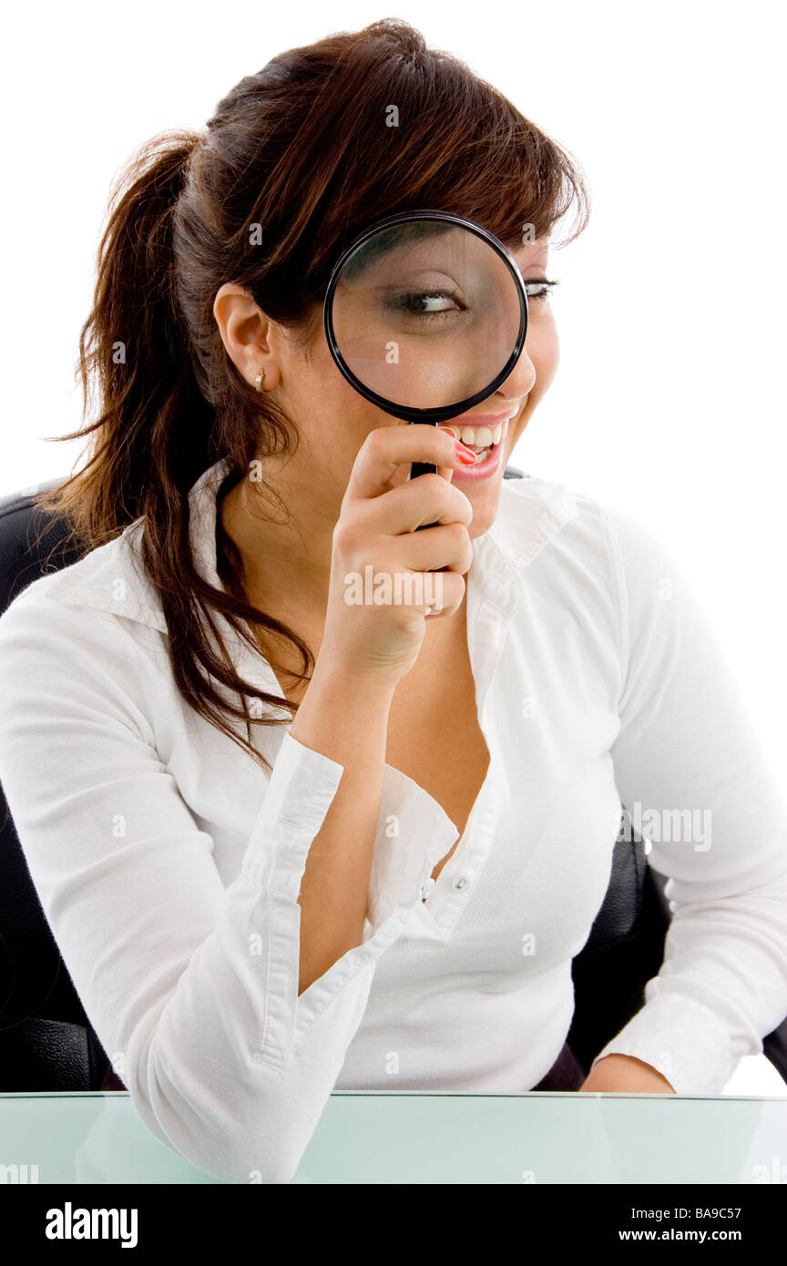 front view of female looking through lens Stock Photo - Alamy