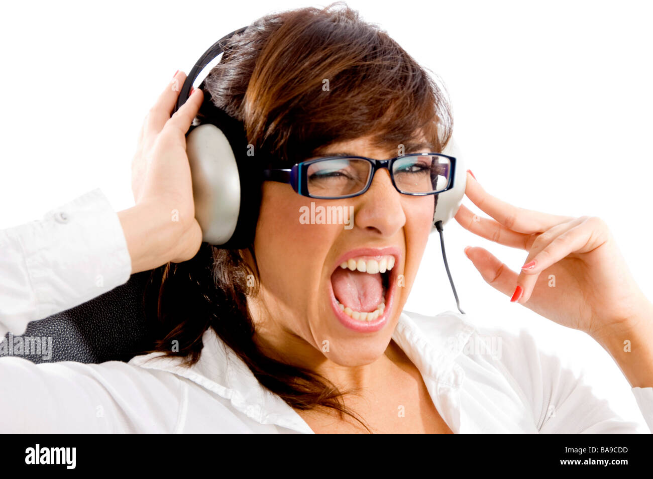 portrait of shouting woman listening music Stock Photo - Alamy