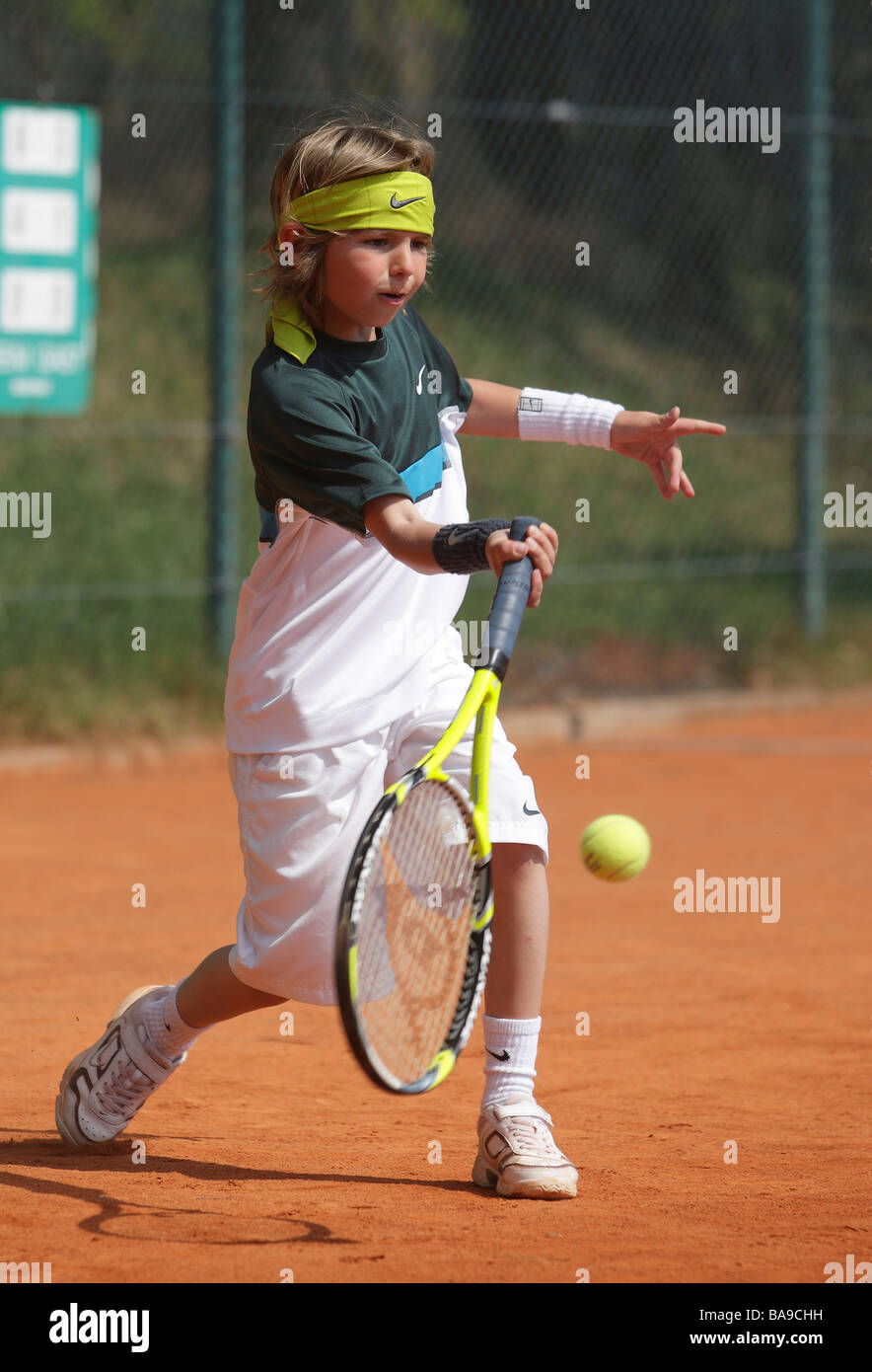 Little boy playing tennis, tennis holiday camp for children Stock Photo ...