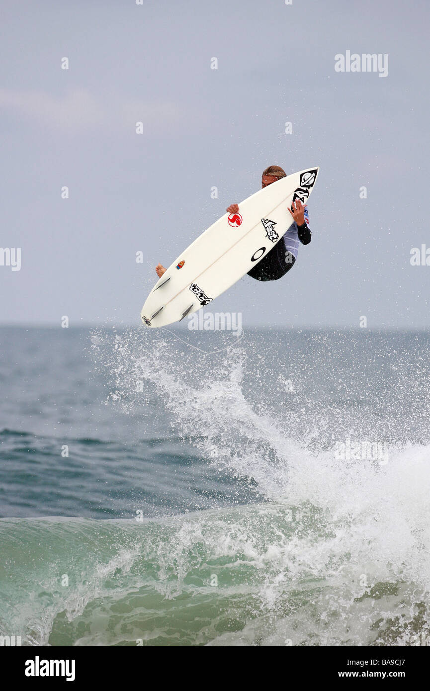Surfer perfoming a Jump Stock Photo - Alamy