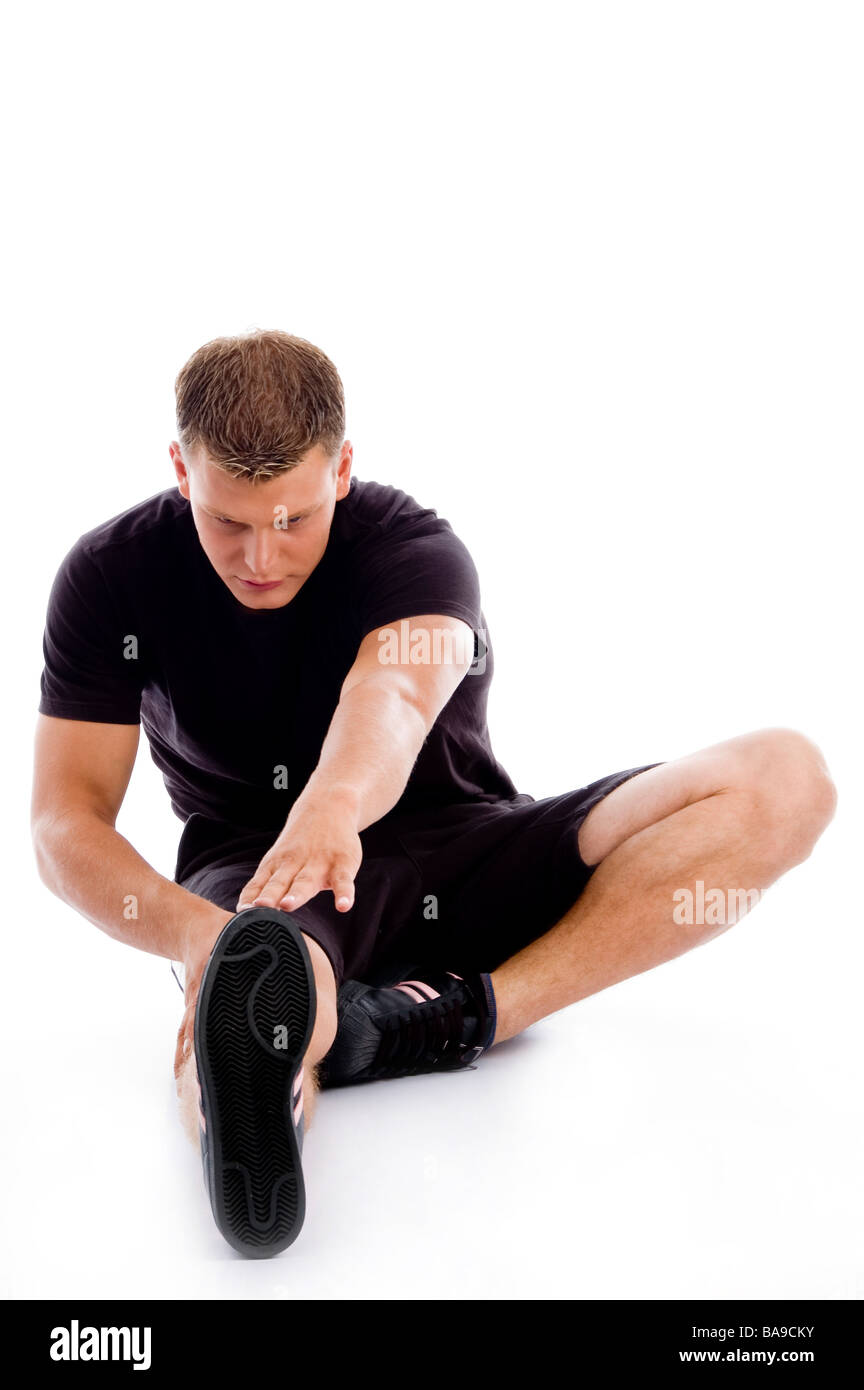 stretching muscular male Stock Photo - Alamy