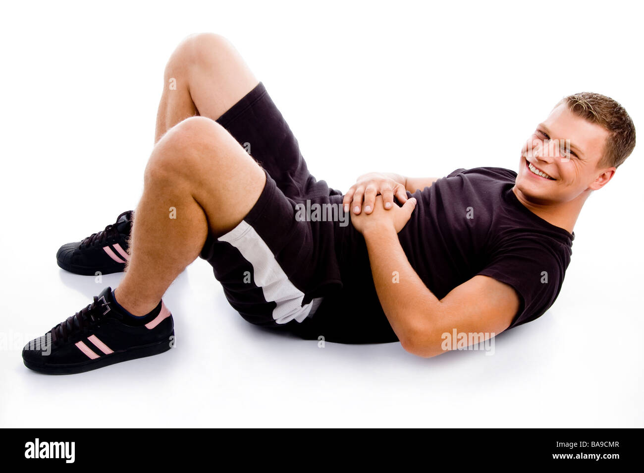 posing laying man Stock Photo - Alamy