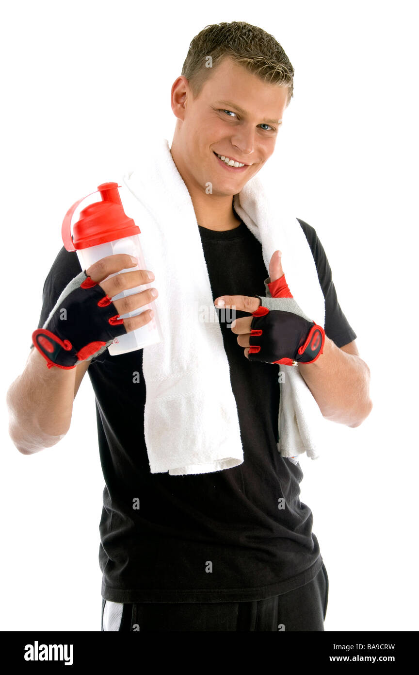smiling man indicating bottle Stock Photo - Alamy